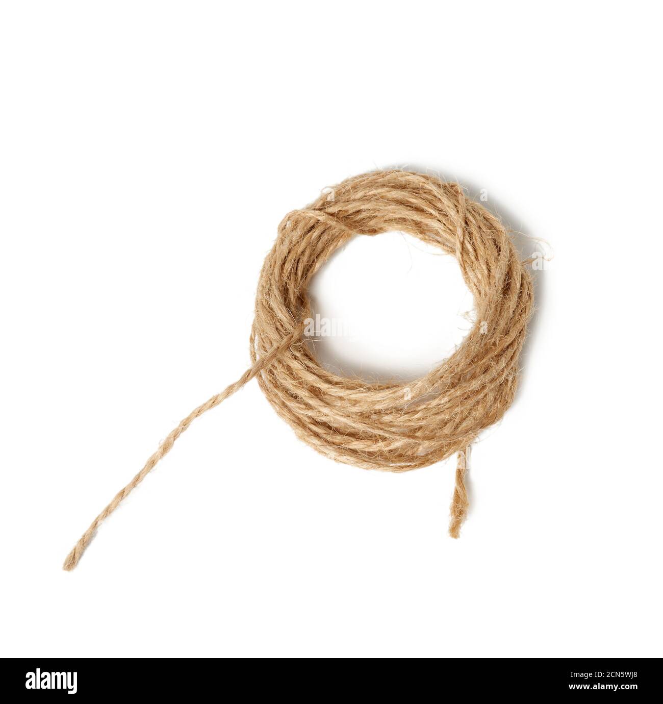 brown folded twine isolated on a white background Stock Photo - Alamy
