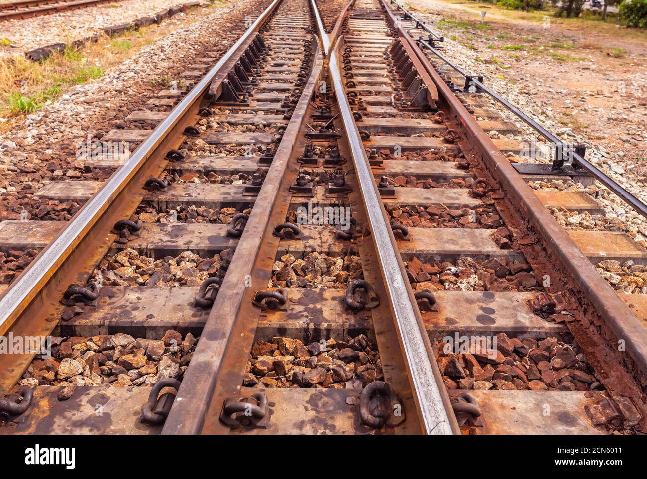 Close up the rusted train tracks Stock Photo - Alamy