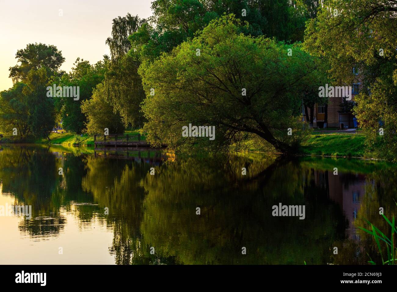 colorful dawn early morning over a body of water Stock Photo - Alamy