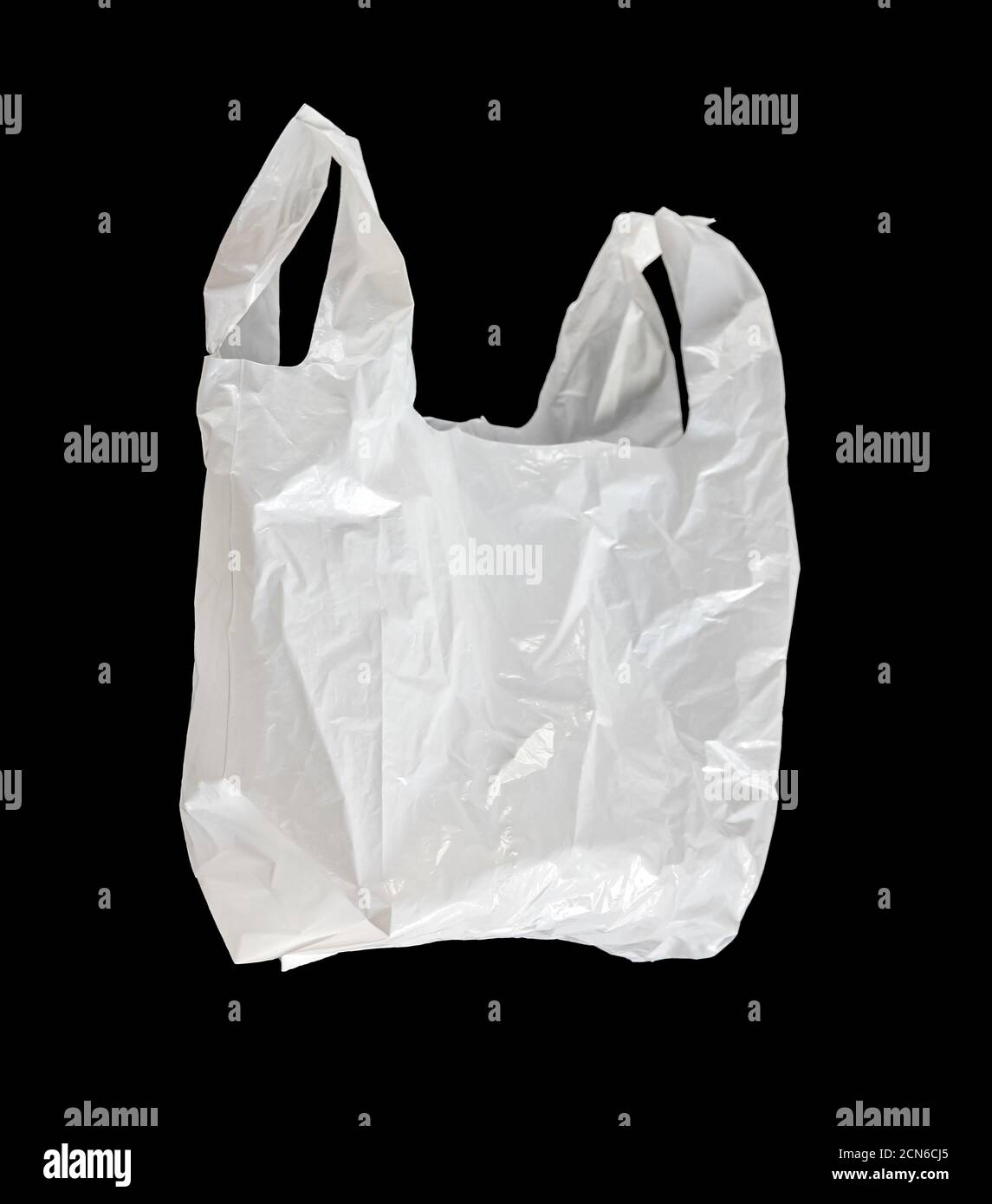 White plastic bag isolated on black background Stock Photo - Alamy