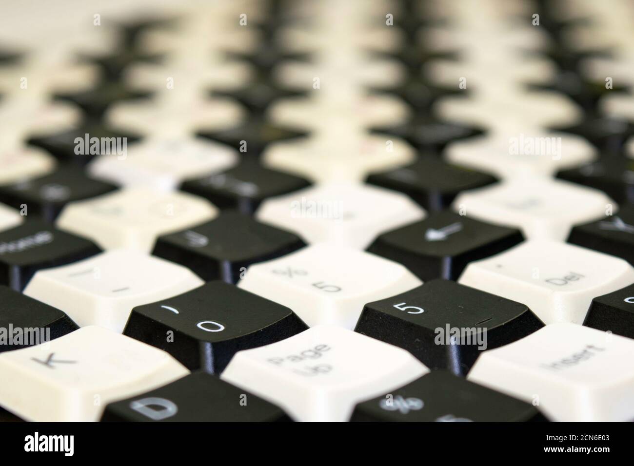 a set of keys from old computer keyboards laid out on the table in a ...