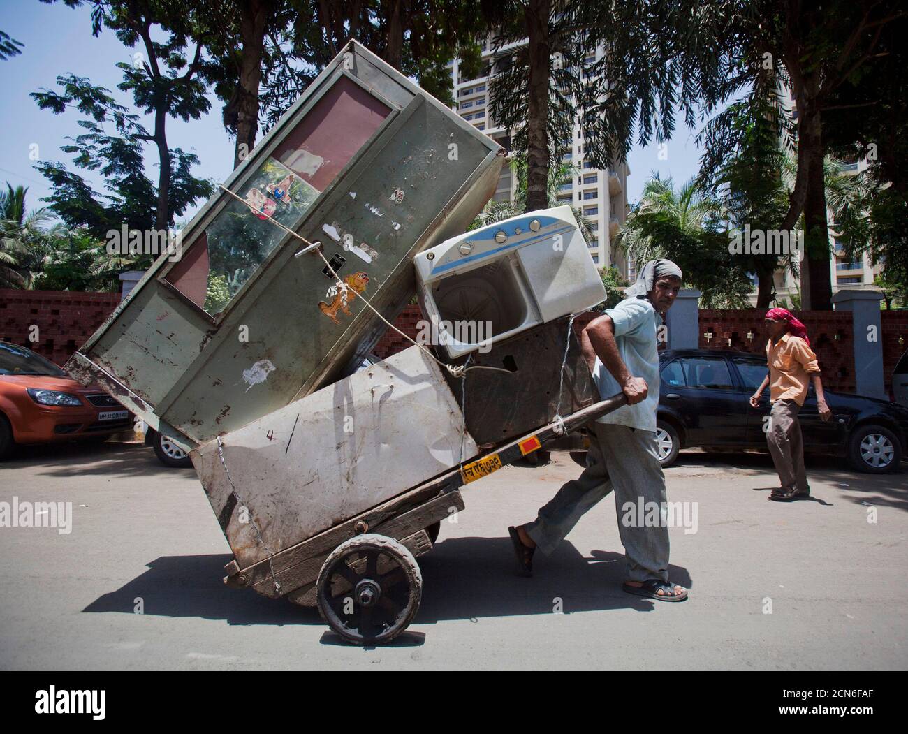 Street man pulls cart hi-res stock photography and images - Alamy