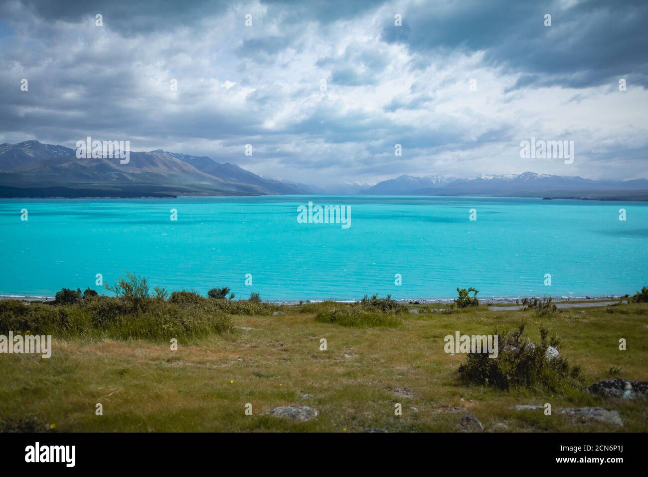 The bright blue teal color of Lake Pukaki in New Zealand Stock Photo ...
