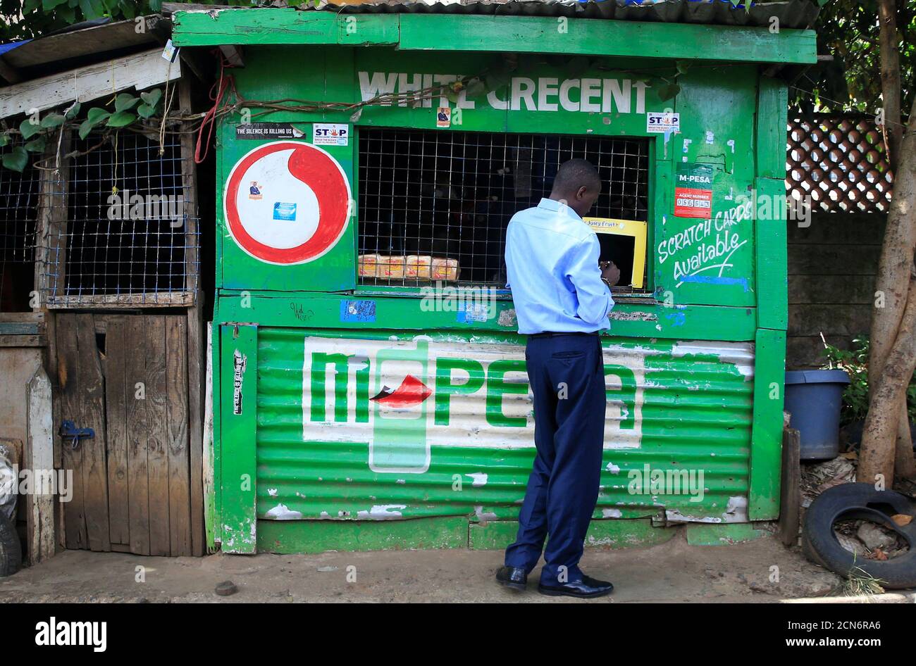 Mobile money agent africa hi-res stock photography and images - Alamy