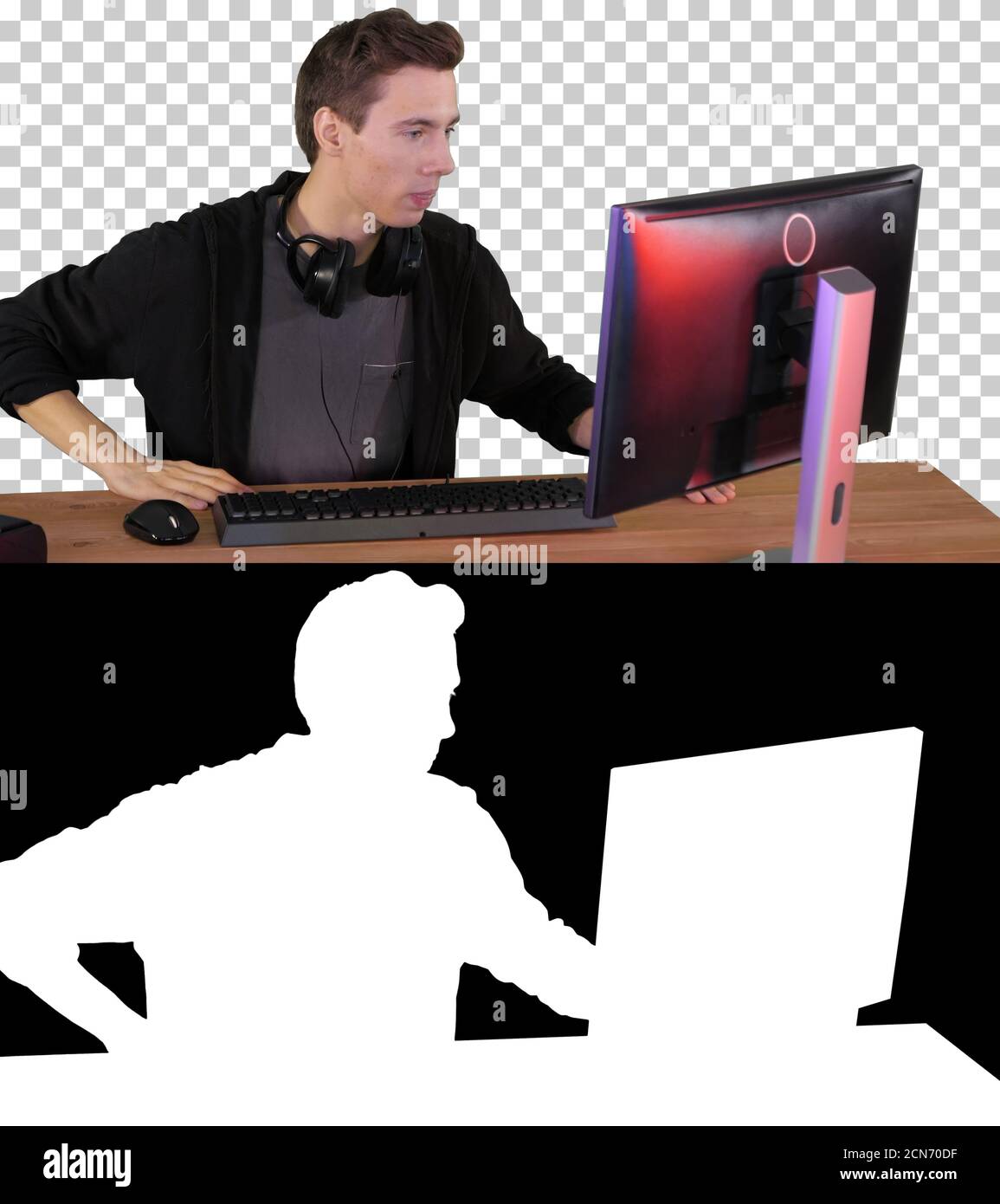 Nervous man watching video games on a PC computer, Alpha Channel Stock ...