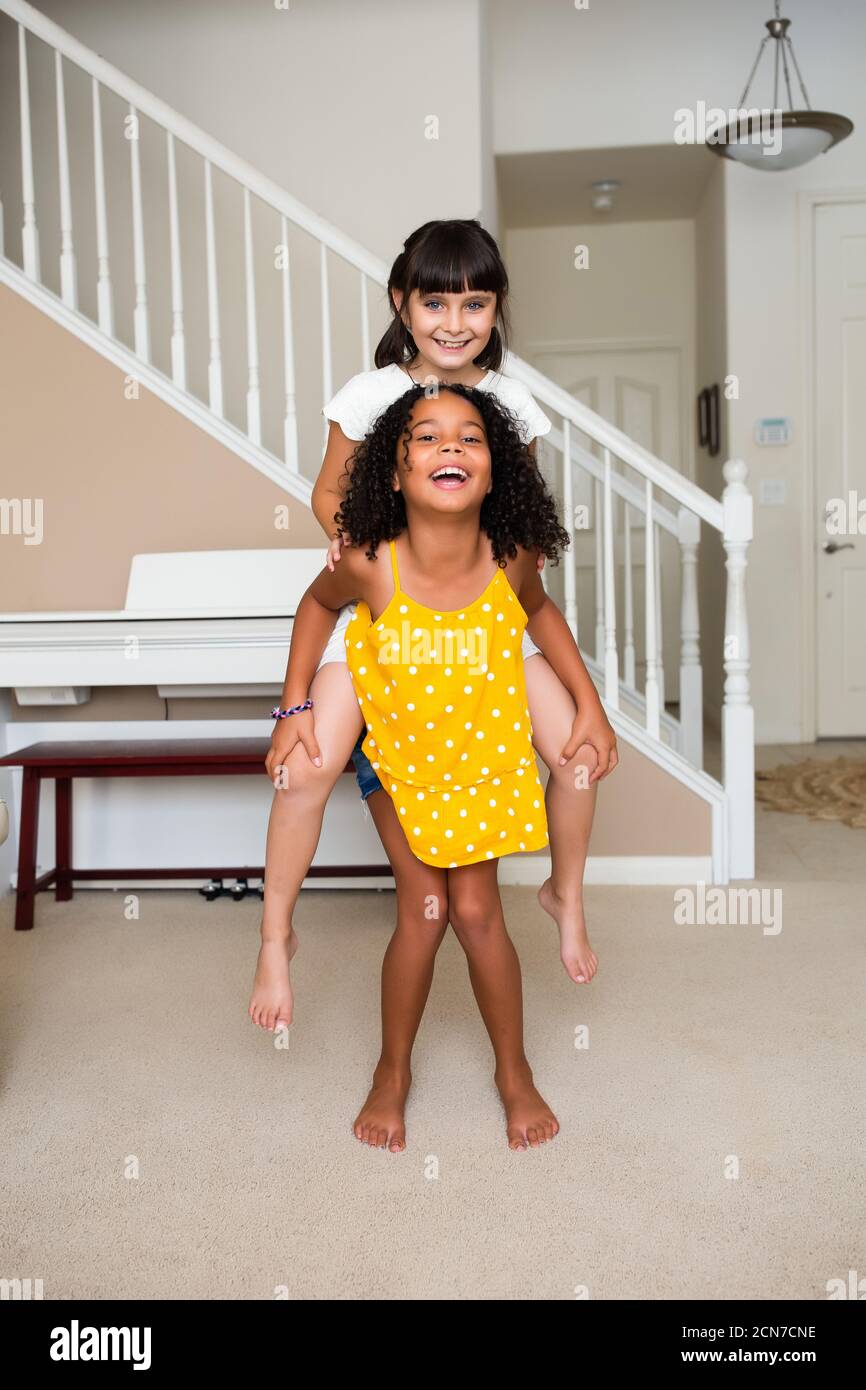 Multicultural Kids Playing together at home Stock Photo - Alamy