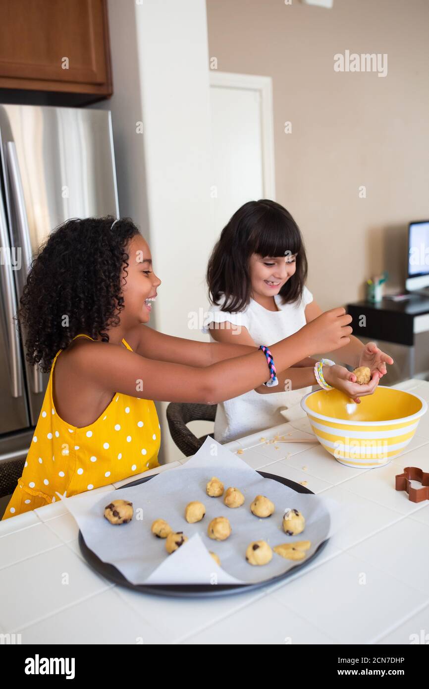 Kids Baking Cookies Together at home Stock Photo - Alamy