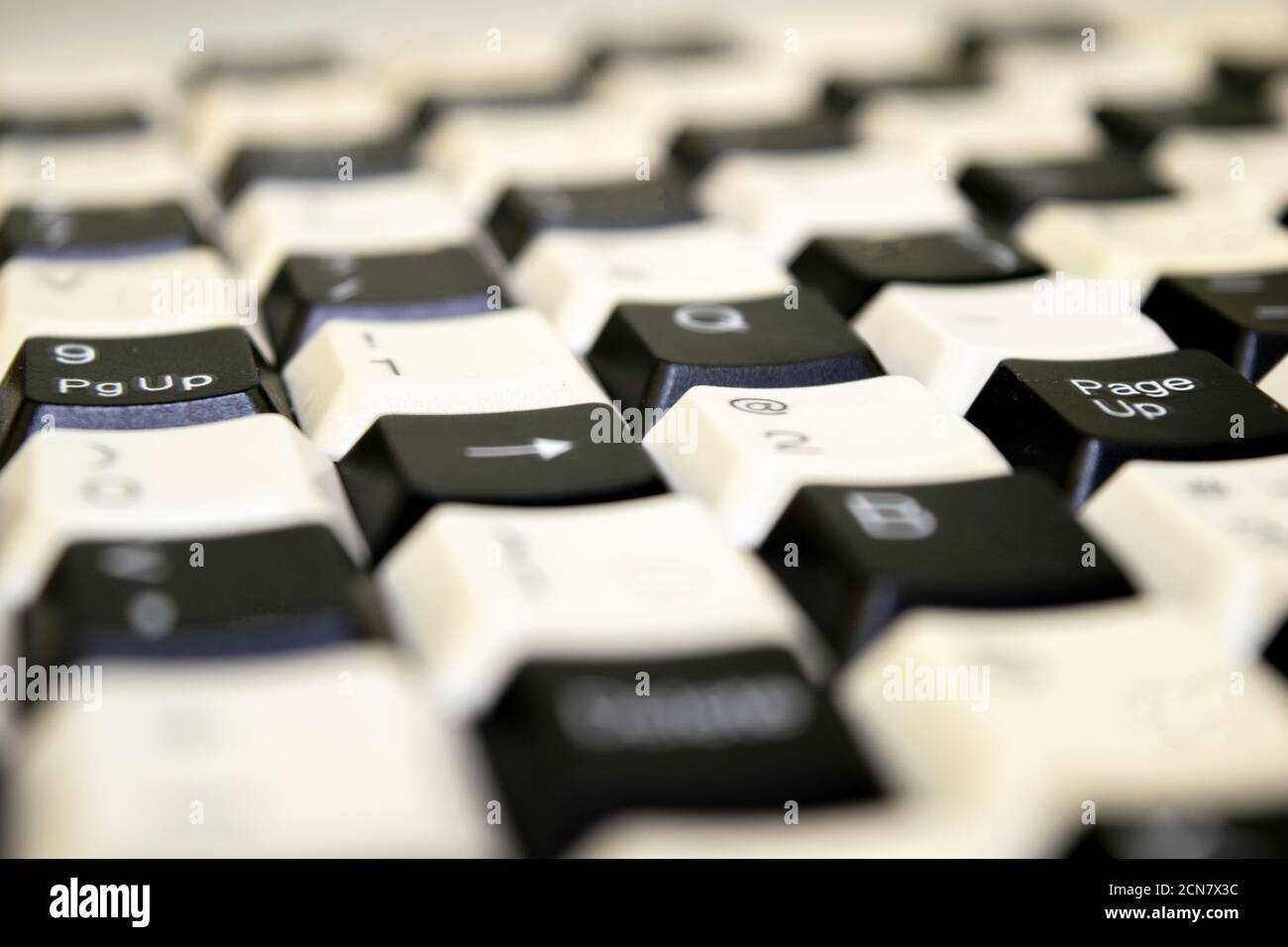 a set of keys from old computer keyboards laid out on the table in a ...