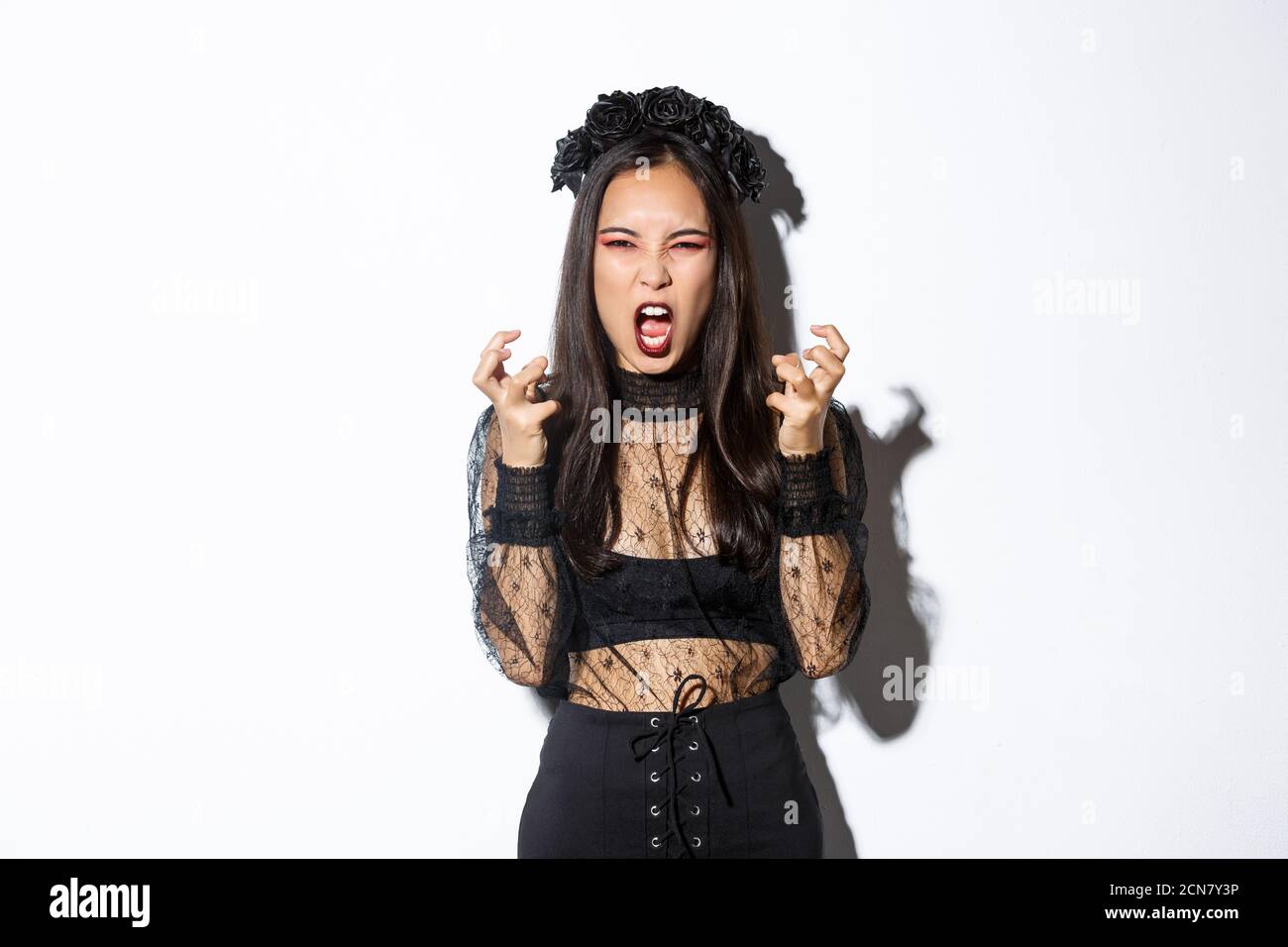 Image of mad woman in gothic lace dress and black wreath yelling angry ...