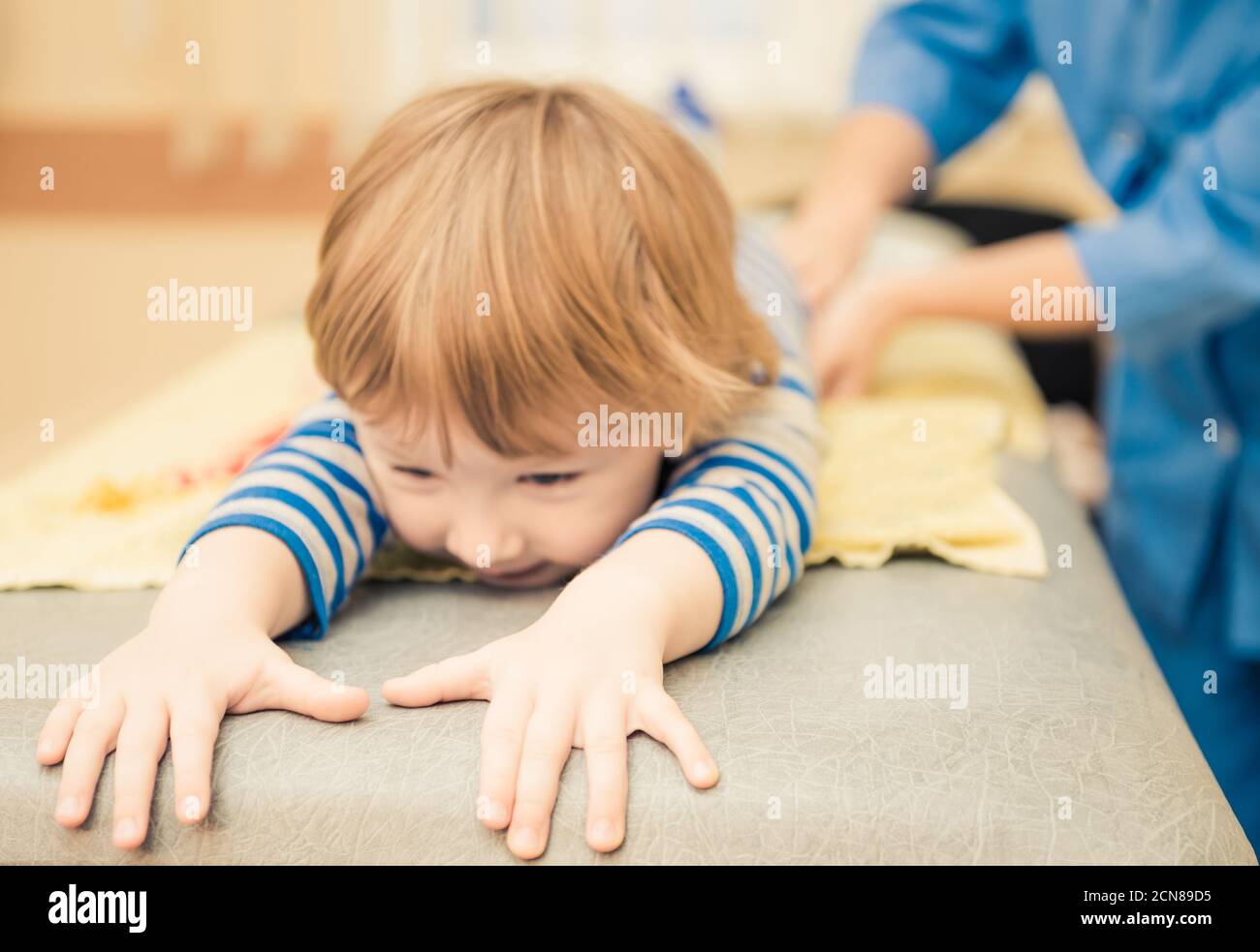 Child massage therapy hi-res stock photography and images - Alamy