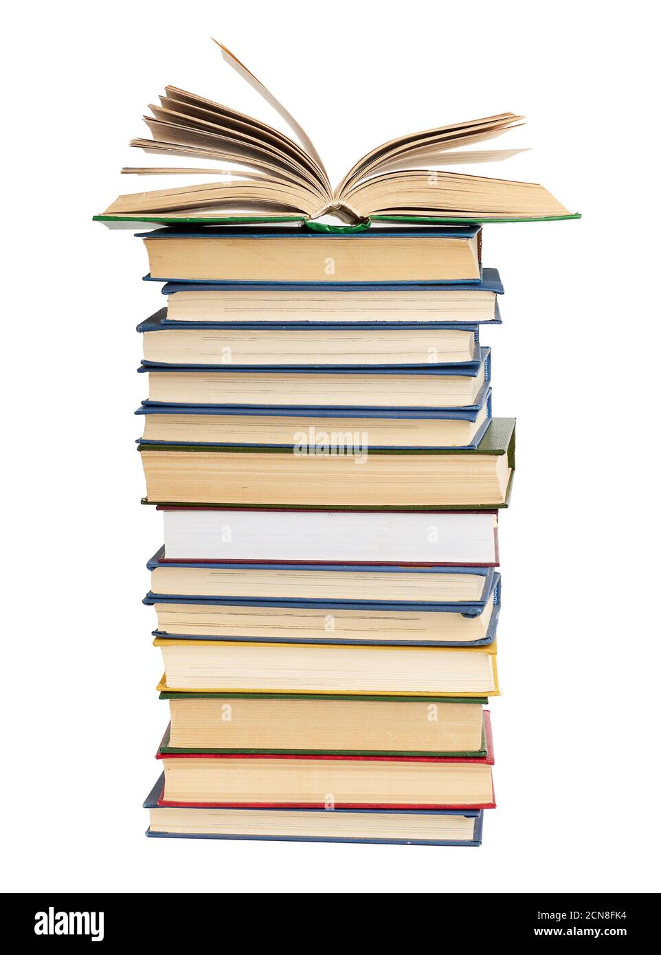 stack of various books, on top an open book, items are isolated on ...