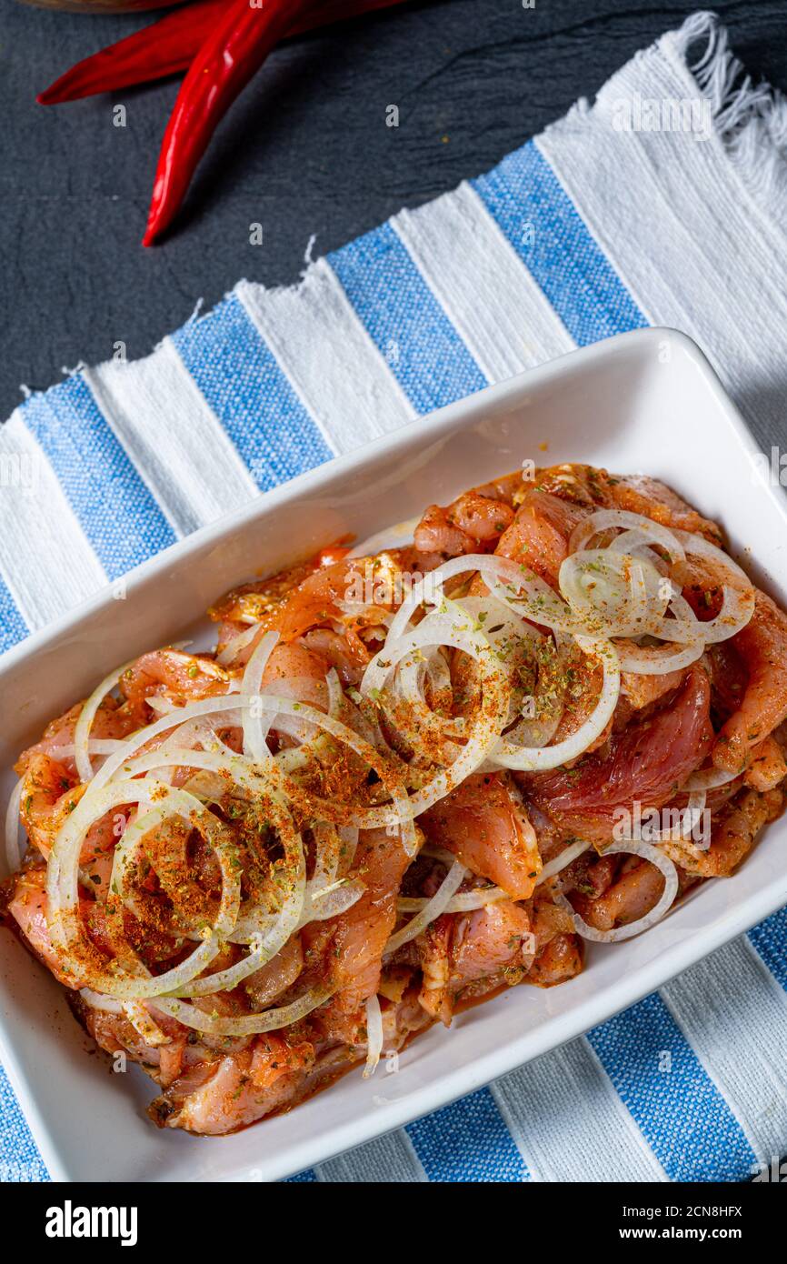 Freshly seasoned Greek gyros meat Stock Photo - Alamy