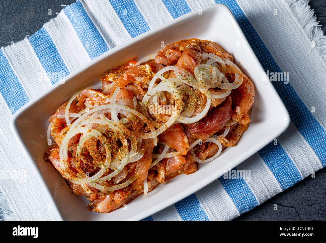 Freshly seasoned Greek gyros meat Stock Photo - Alamy