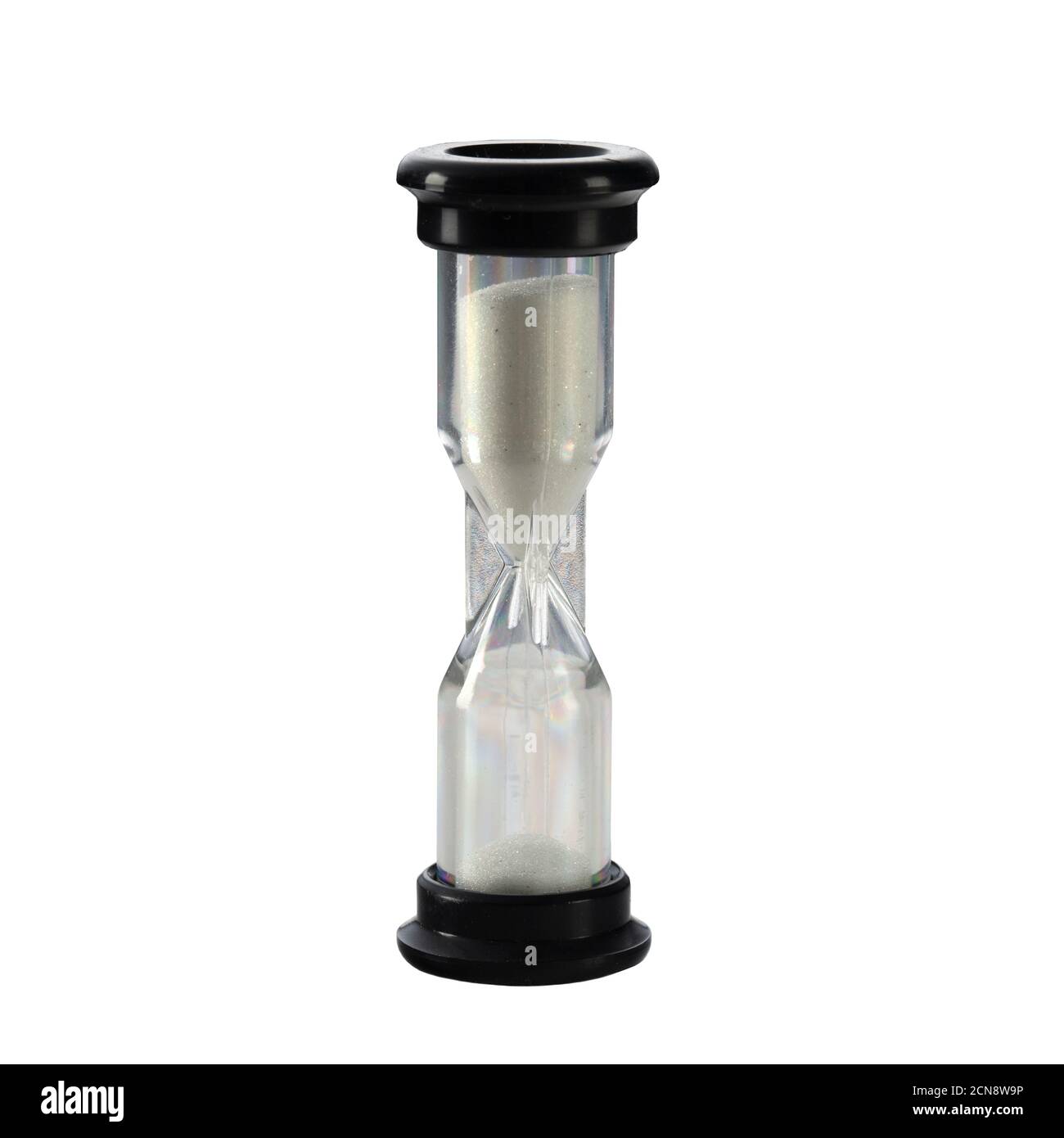 Sand in hourglass isolated on white background. Time passing concept ...