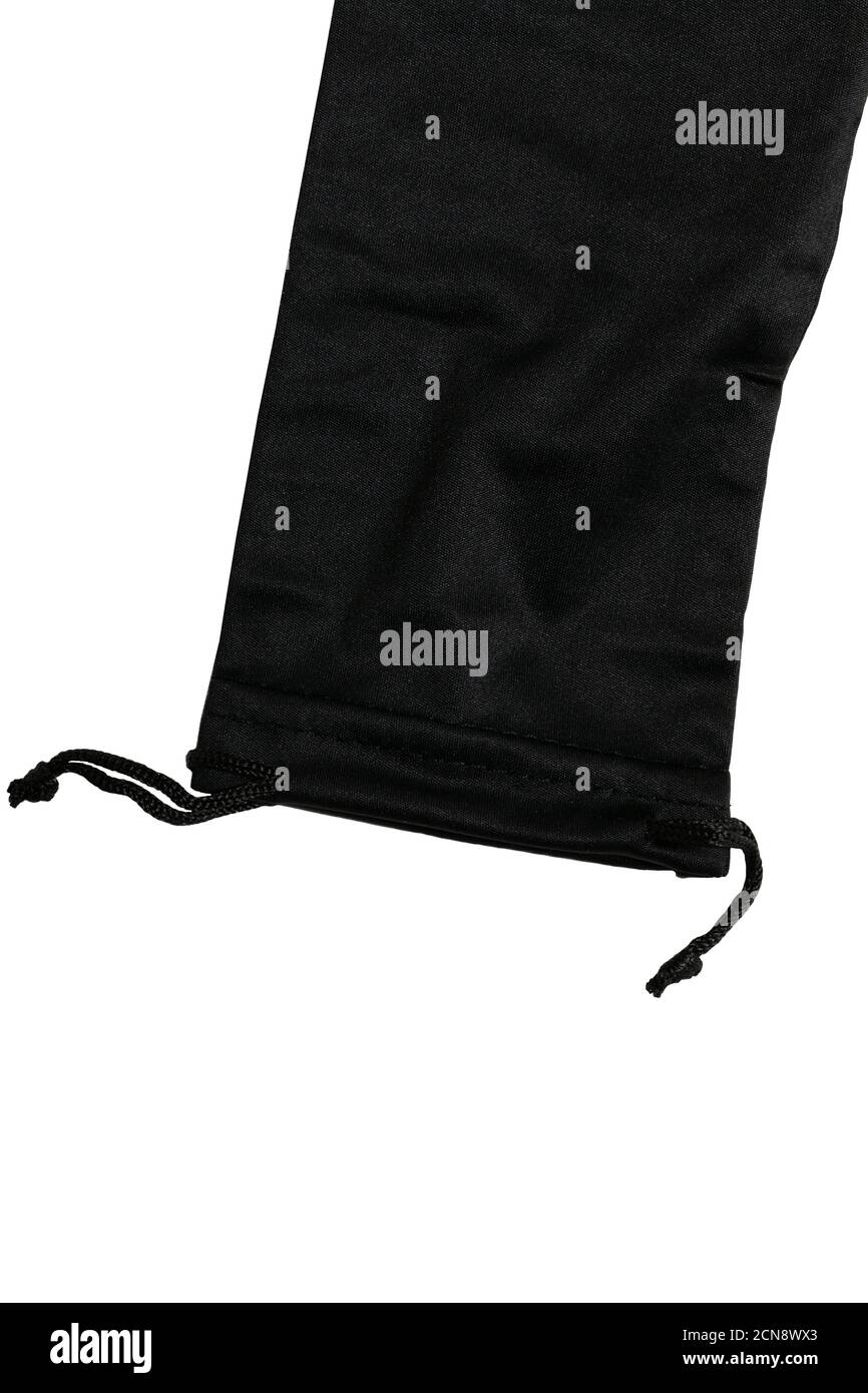 black small bag for change with lace. fabric bag with ties isolated on ...