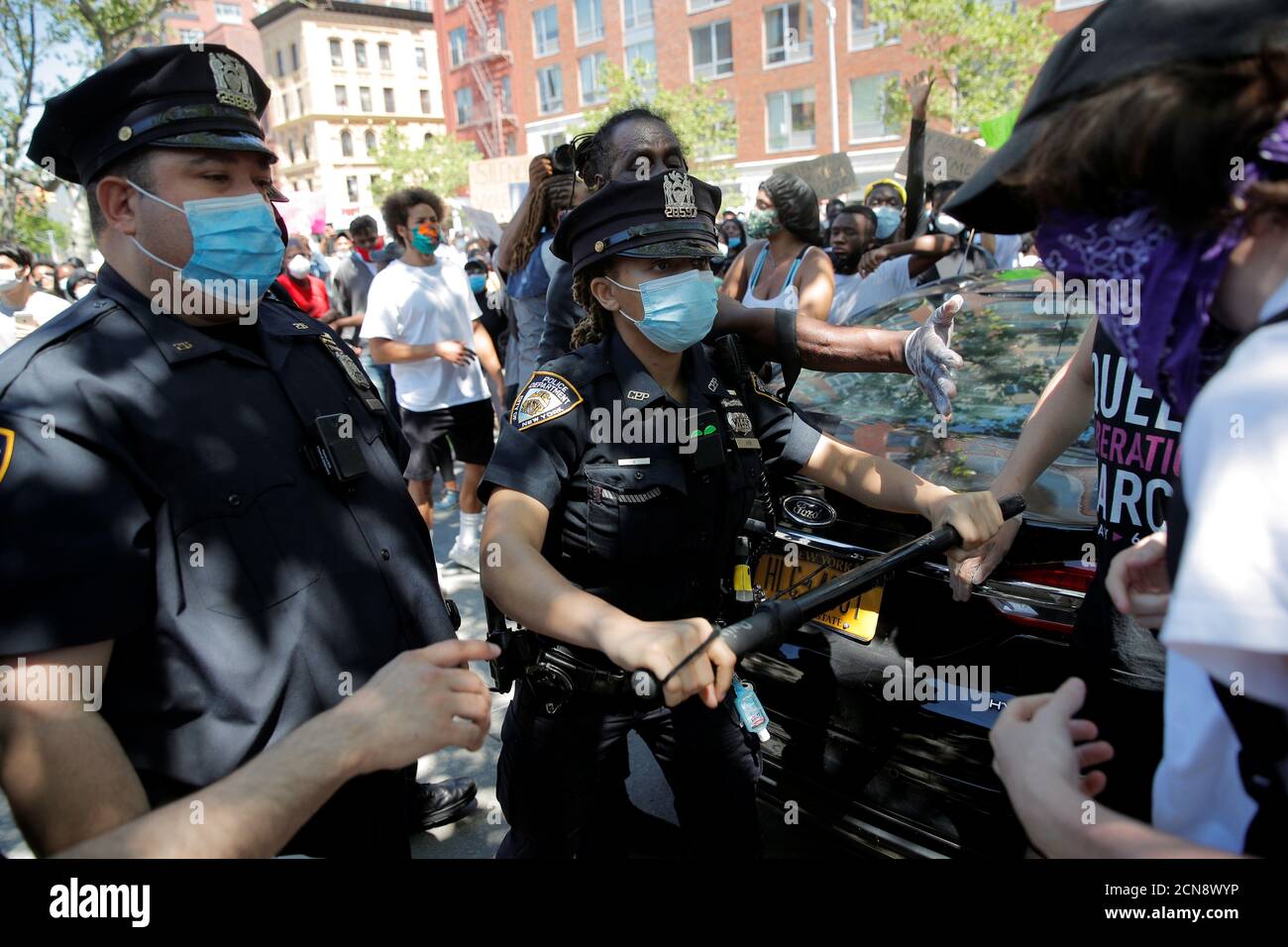 African american police with masks hi-res stock photography and images ...