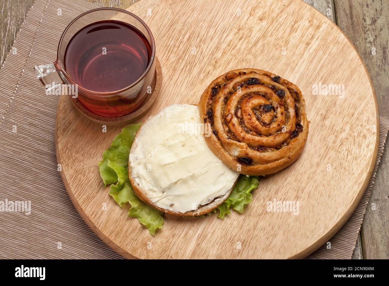 Cup Of Tea, Pastry And Butter Stock Photo - Alamy