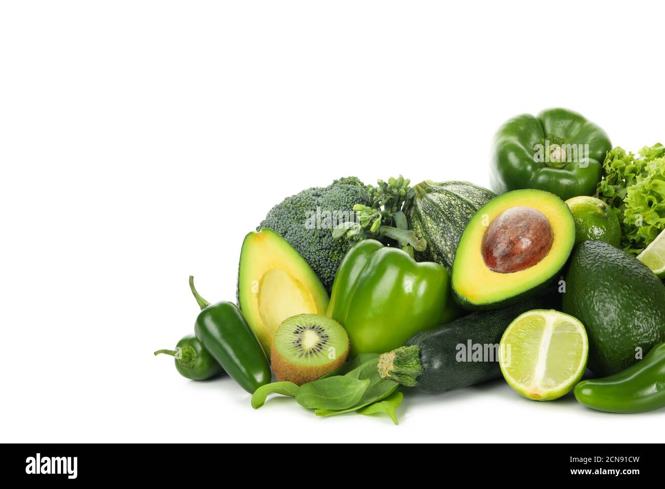 Bunch of green vegetables isolated on white background Stock Photo - Alamy