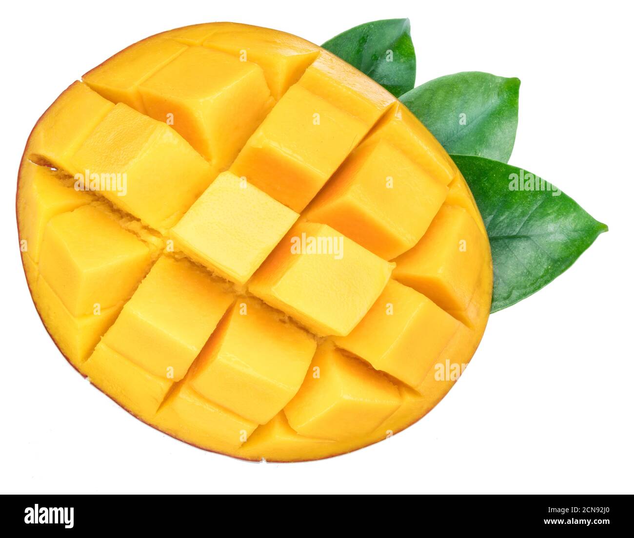 Cross section of mango fruit cut into cubes with a leaf. File contains ...