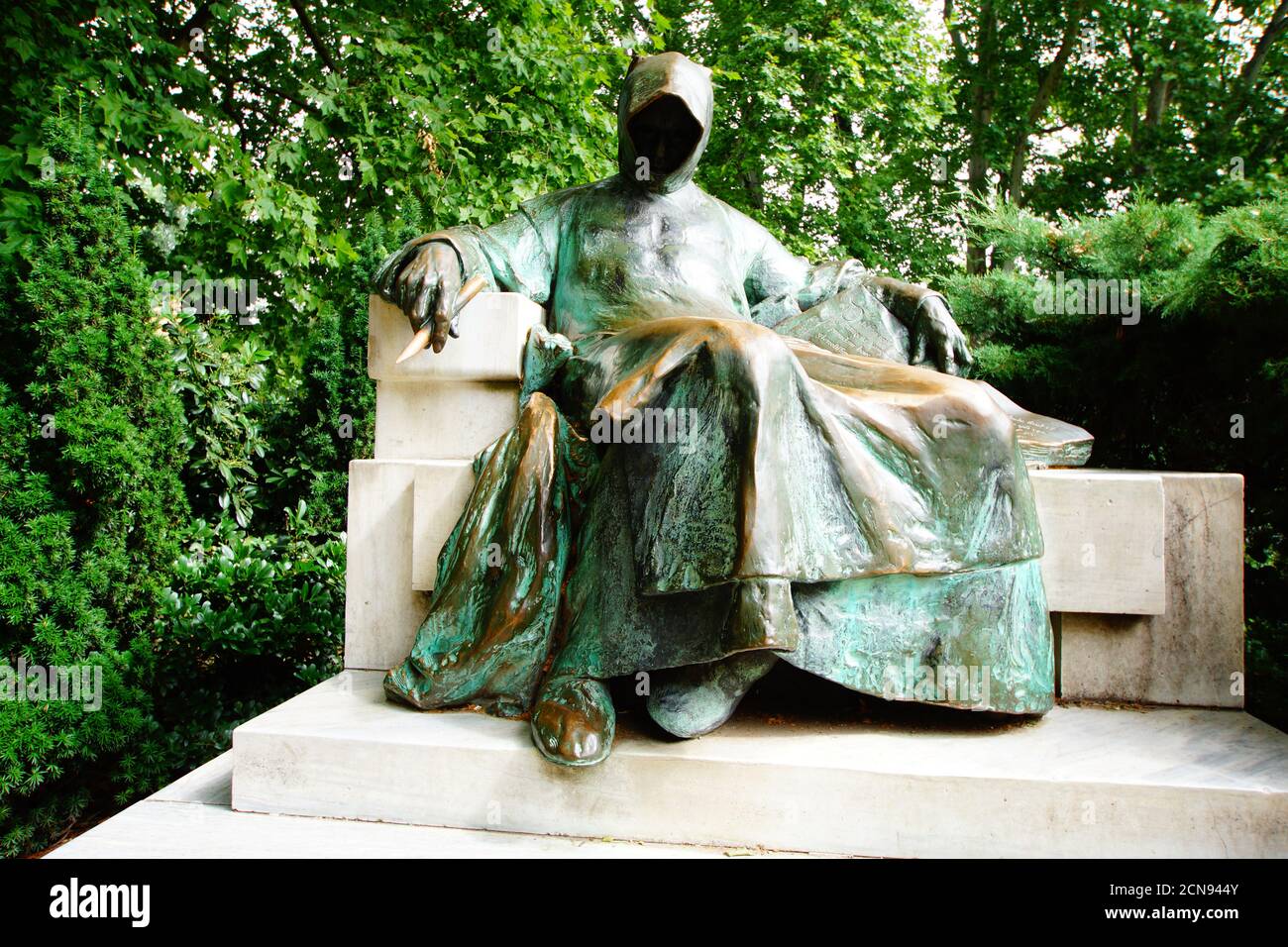 Bronze statue of the man with the pen Stock Photo - Alamy