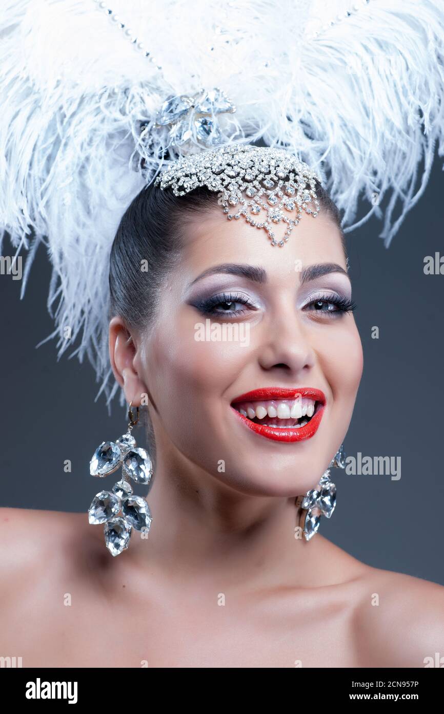 Model in feather dress hi-res stock photography and images - Alamy