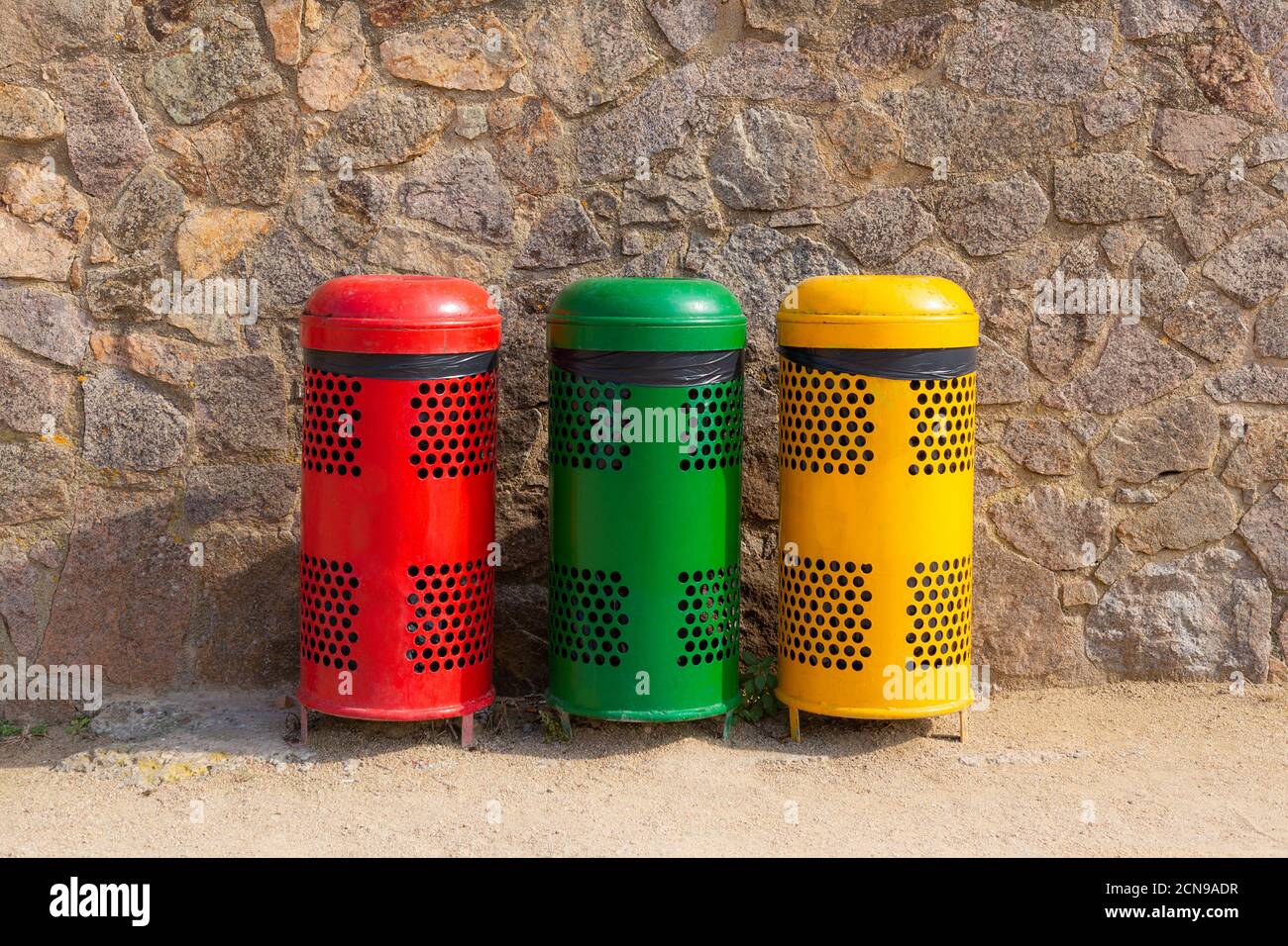 Three multicolored recycle bins for waste near the wall Stock Photo - Alamy Three multicolored recycle bins for waste near the wall Stock Photo - Alamy