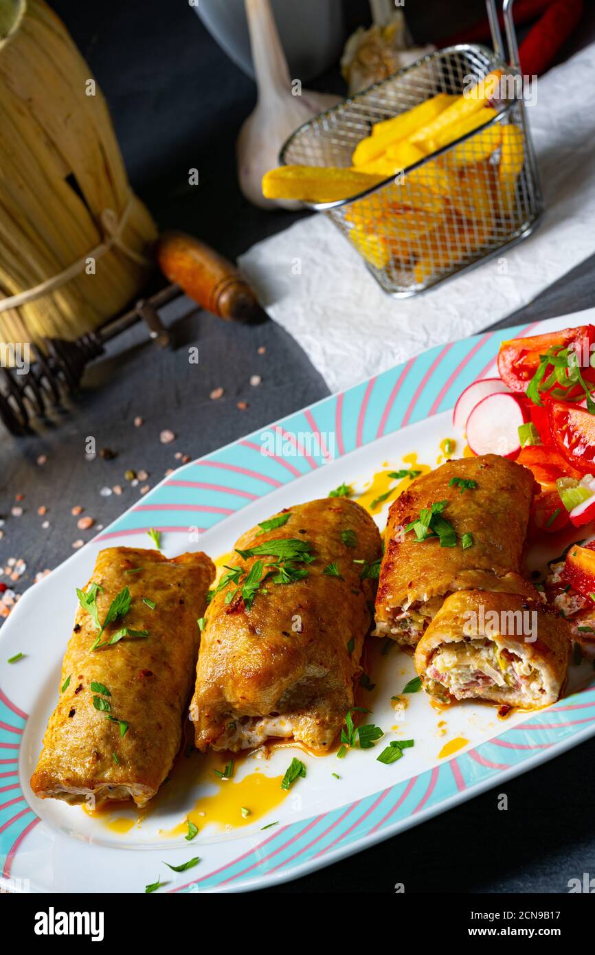 Vegetable roulade from roast pork loins with salads Stock Photo - Alamy