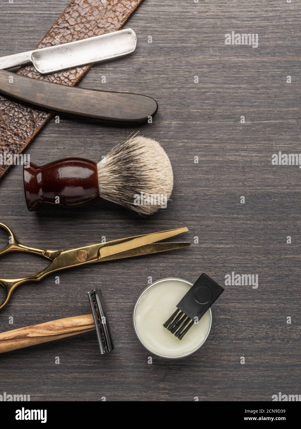 Classic grooming and hairdressing tools on wooden background. Top view ...