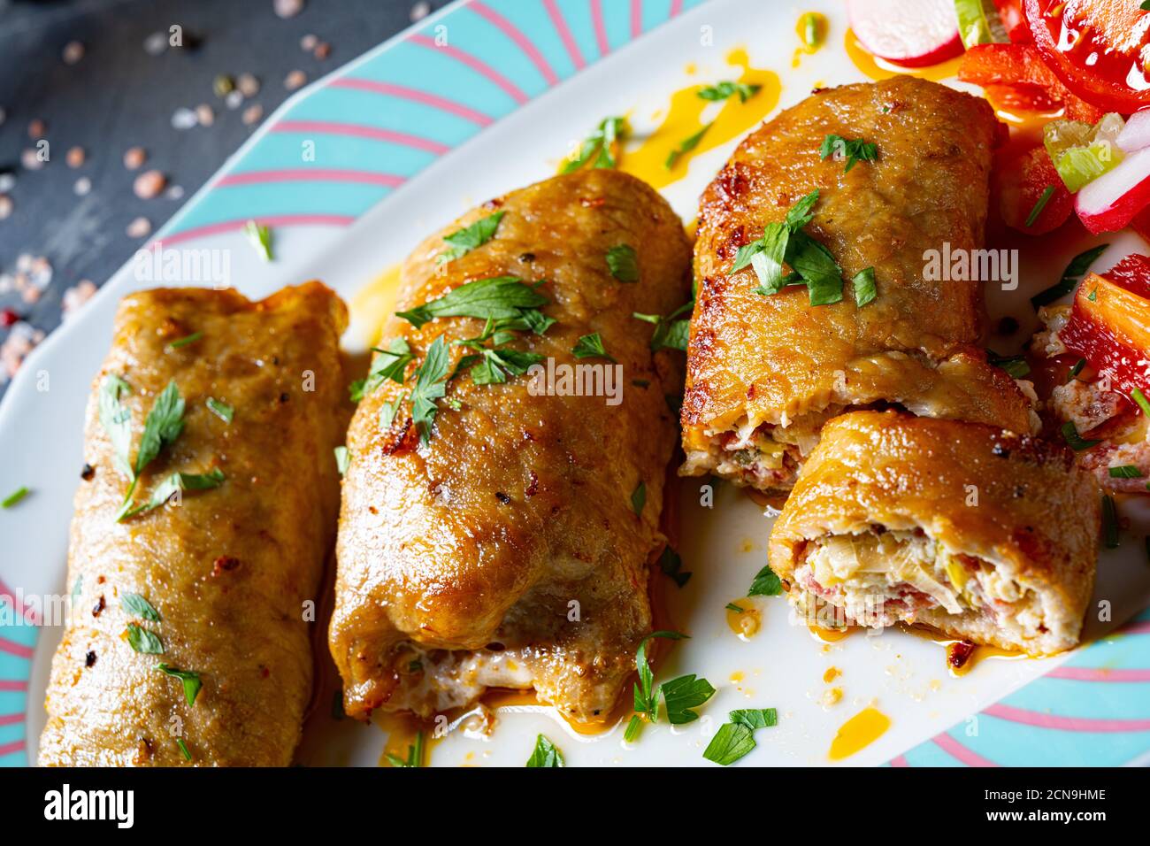 Vegetable roulade from roast pork loins with salads Stock Photo - Alamy