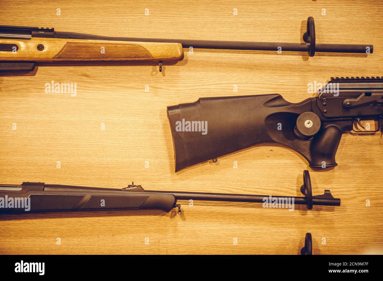 Hunting rifles on wall hi-res stock photography and images - Alamy