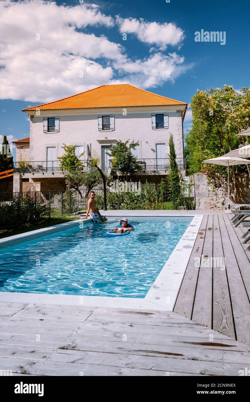 Couple swimming pool france hi-res stock photography and images - Alamy