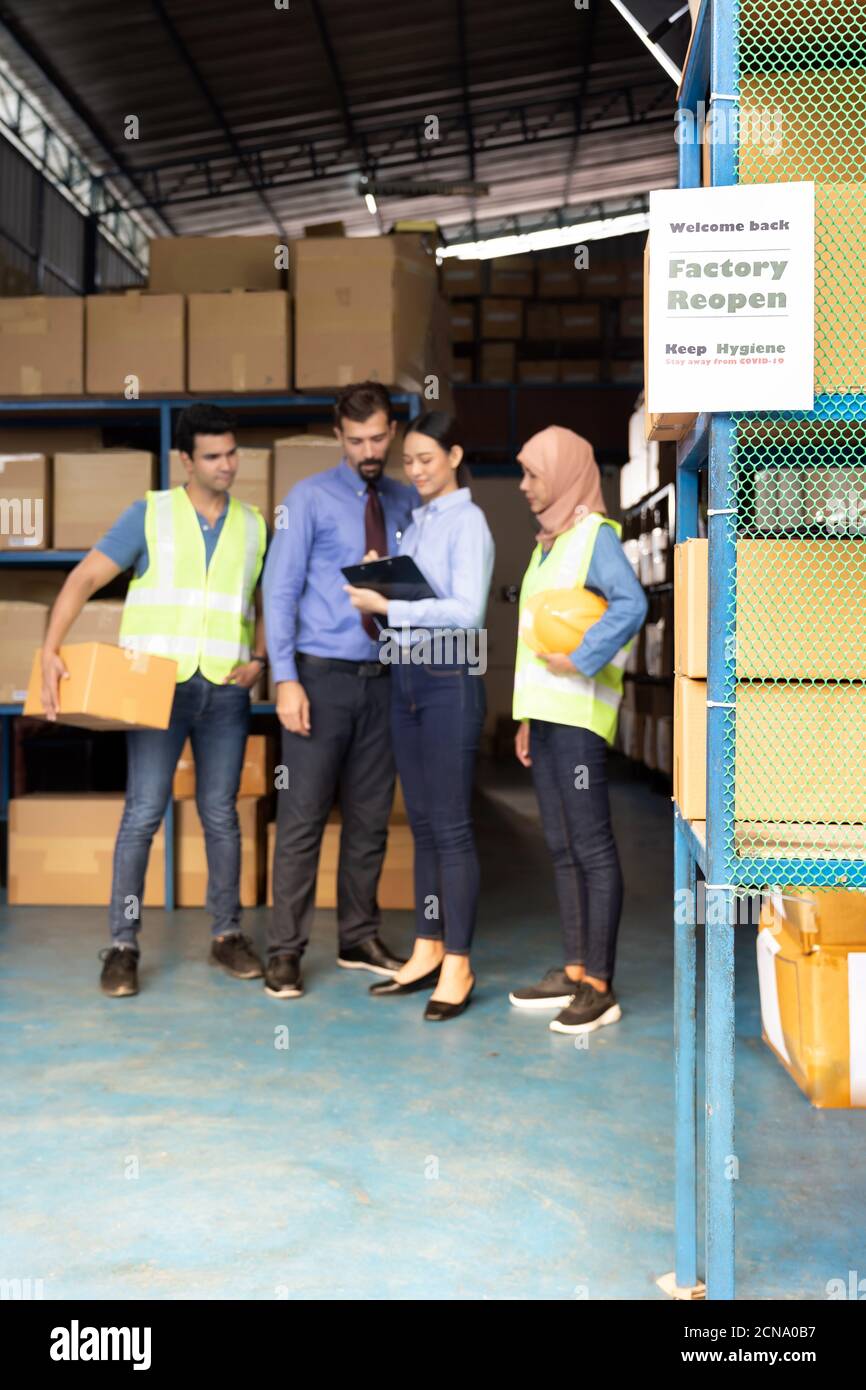 Factory reopen signage after COVID-19 pandemic Stock Photo - Alamy