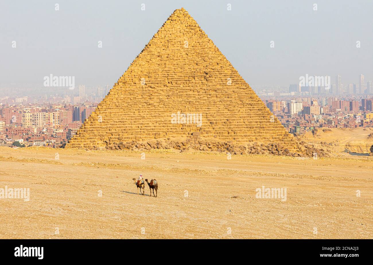 Giza pyramid and cityscape on sunny day, Cairo, Egypt Stock Photo - Alamy