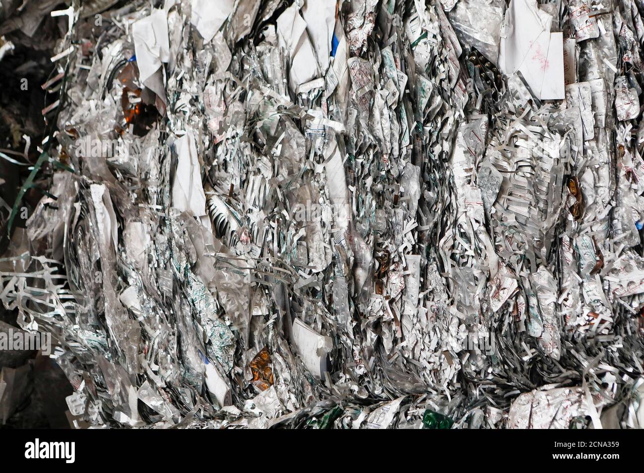 Recycled paper bundles Stock Photo - Alamy