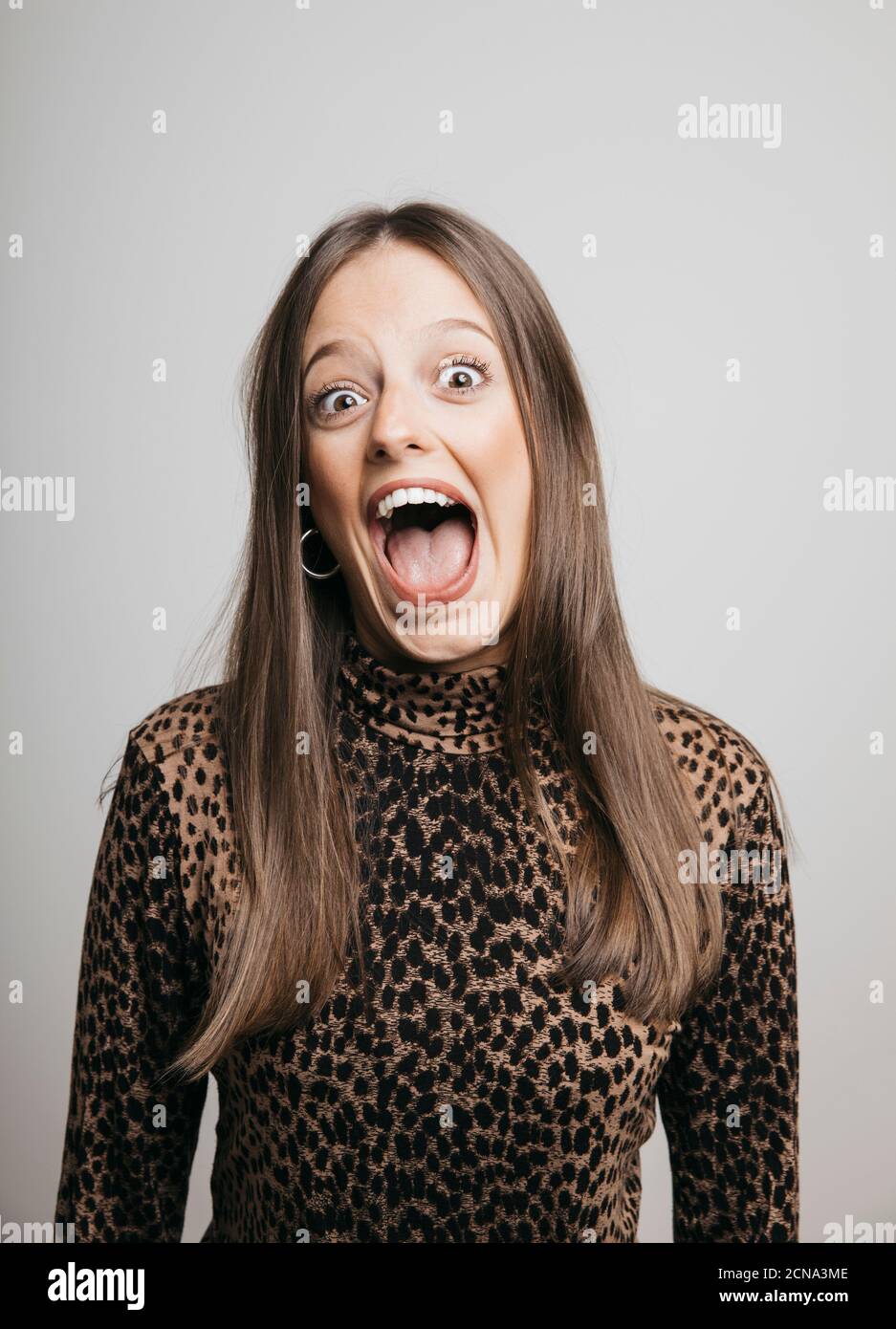 Portrait excited young woman with mouth open Stock Photo - Alamy