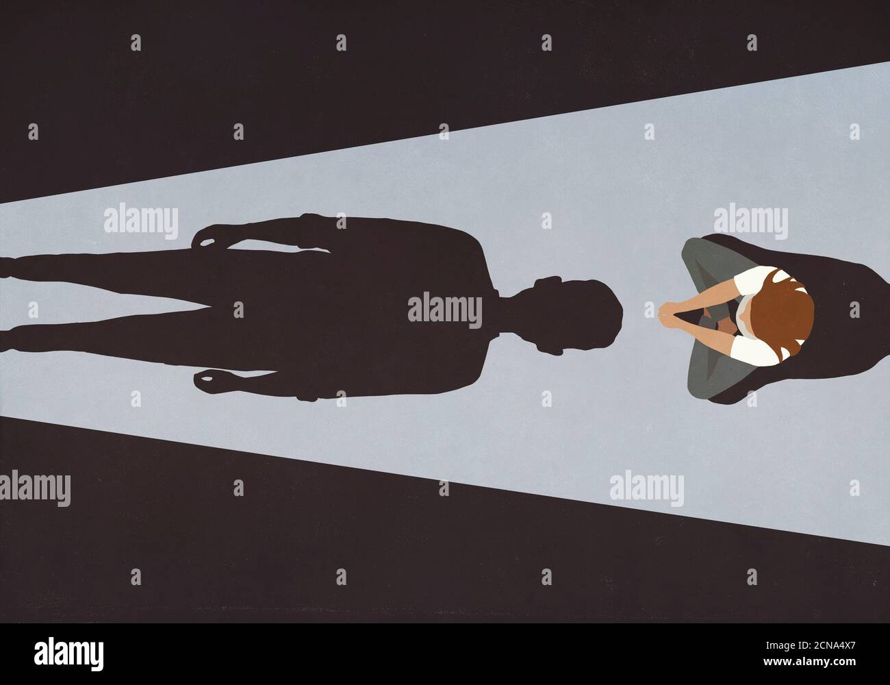 Woman sitting before looming male shadow Stock Photo - Alamy