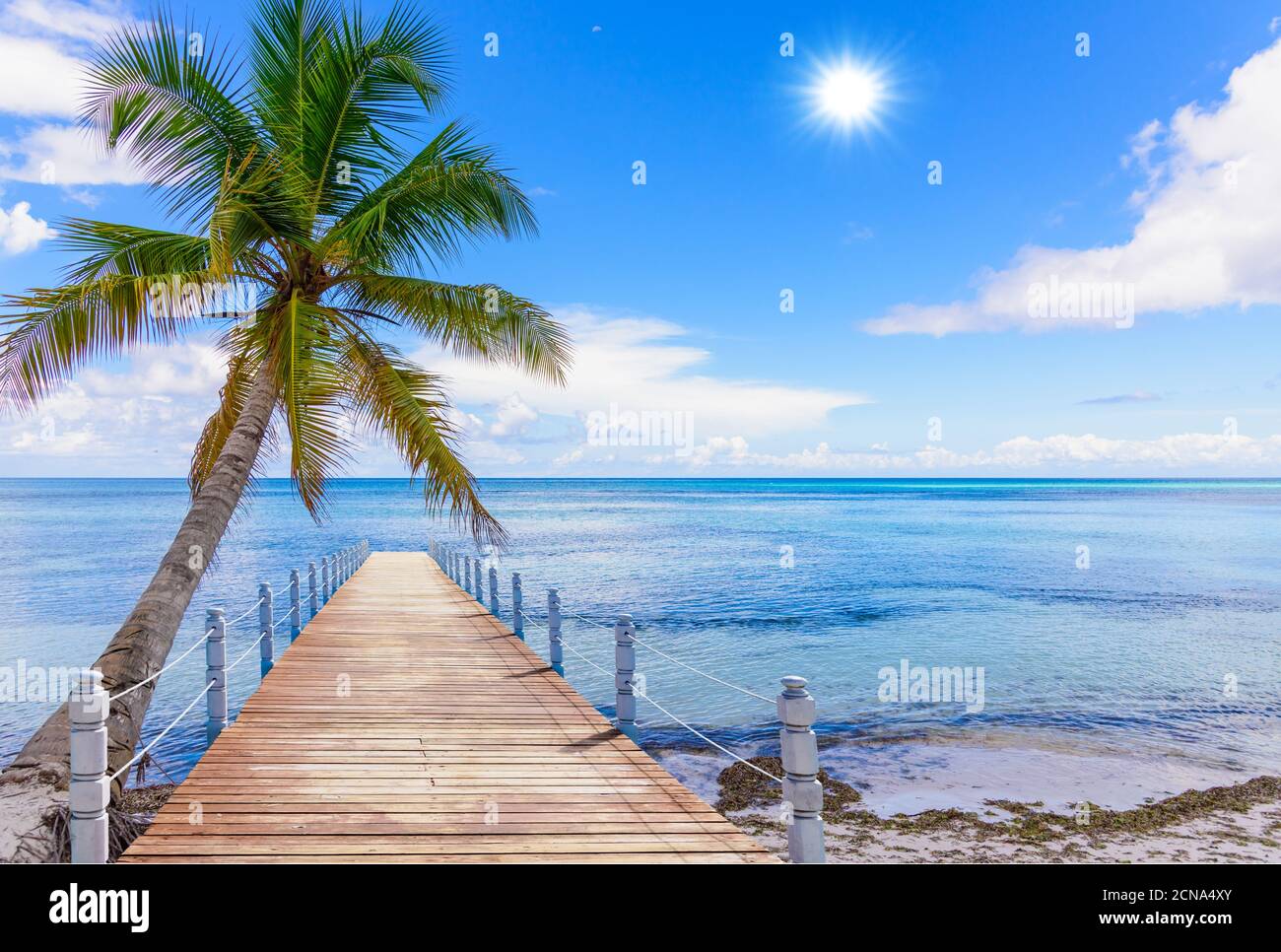 wooden bridge juts out into of the sea Stock Photo - Alamy