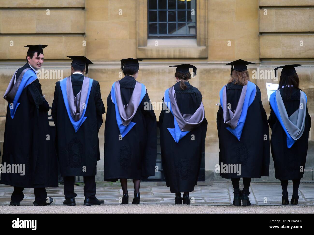 University graduates graduation ceremony oxford hi-res stock ...