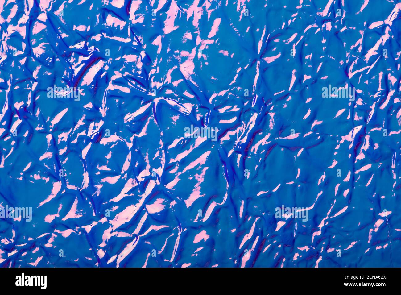 Holographic bright rainbow multicolor real crumpled texture background ...