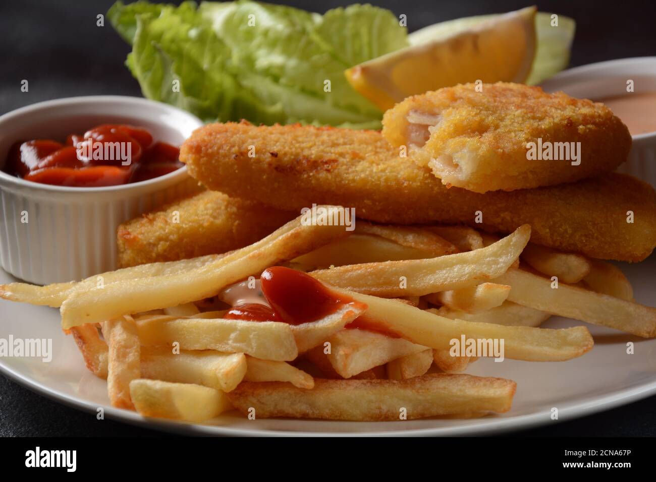 Traditional English Food - Fish and Chips. Fried fish filets and crispy ...