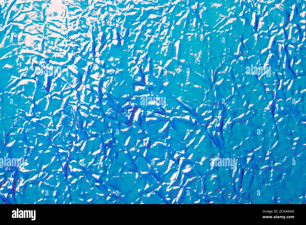 Holographic bright rainbow multicolor real crumpled texture background ...