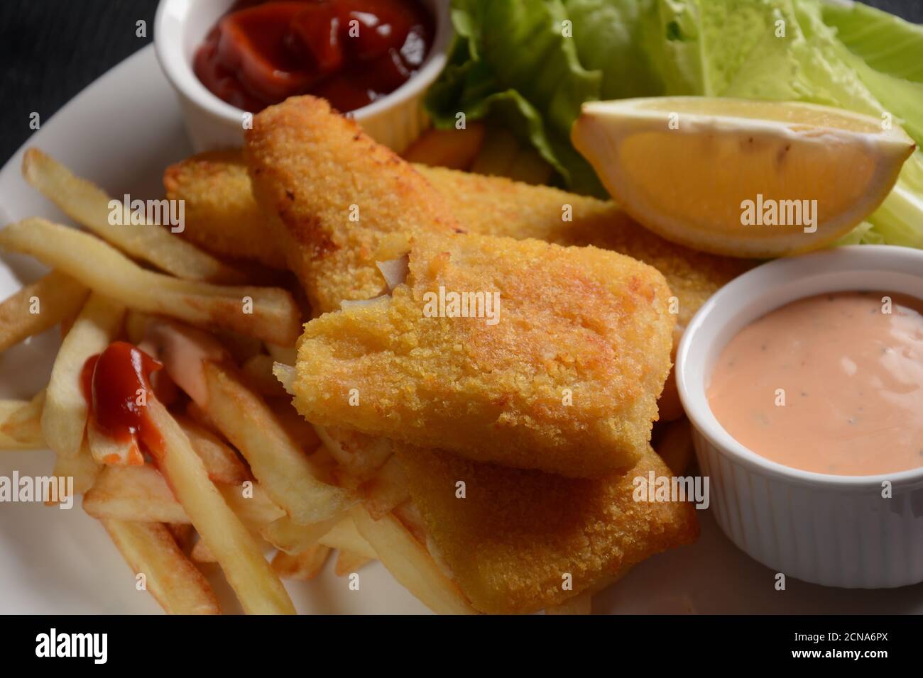 Traditional English Food - Fish and Chips. Fried fish filets and crispy ...