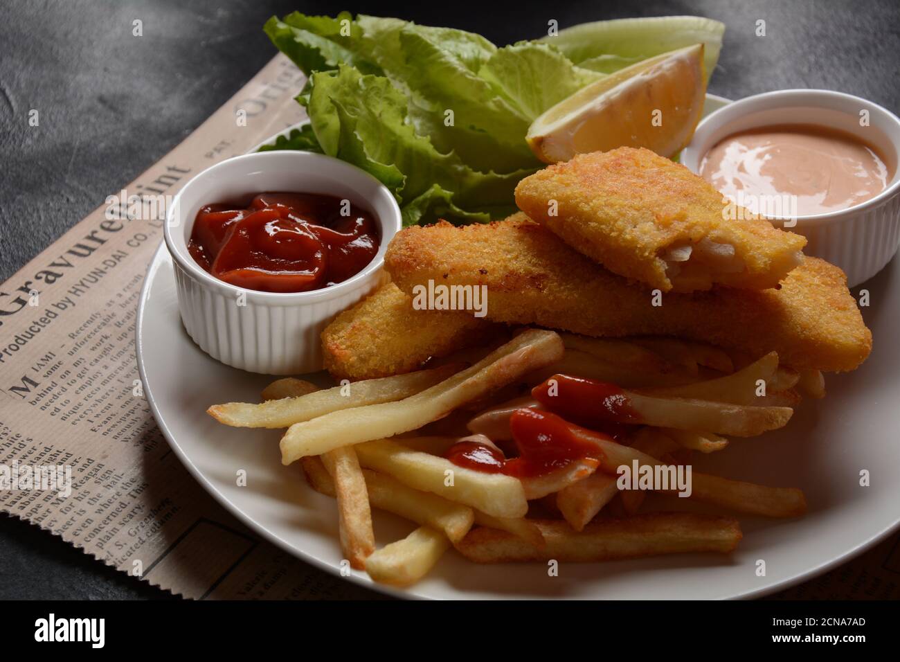Traditional English Food - Fish and Chips. Fried fish filets and crispy ...