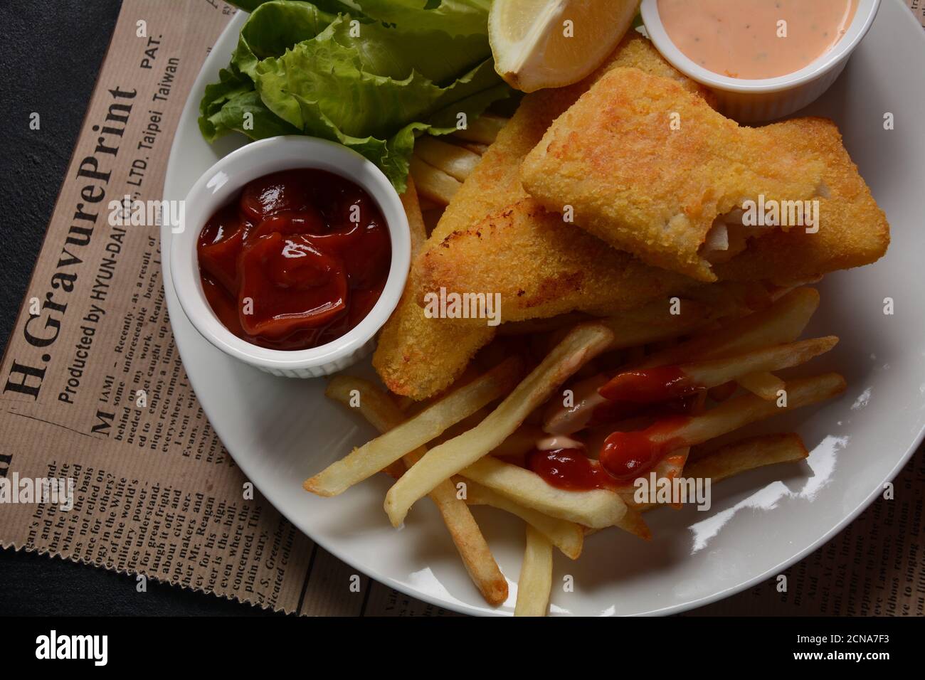 Traditional English Food - Fish and Chips. Fried fish filets and crispy ...