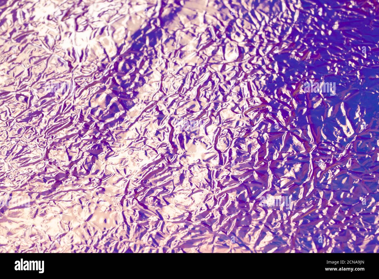 Holographic bright rainbow multicolor real crumpled texture background ...