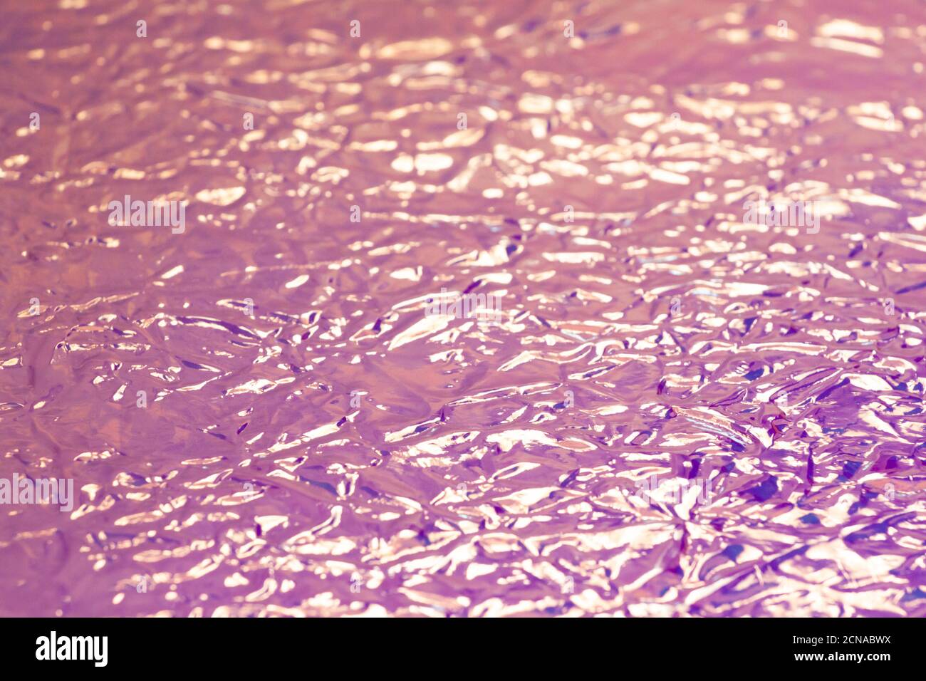 Holographic bright rainbow multicolor real crumpled texture background ...