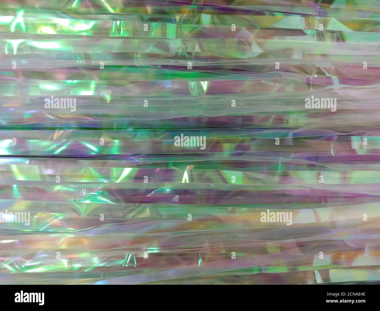 Holographic bright rainbow multicolor real crumpled texture background ...