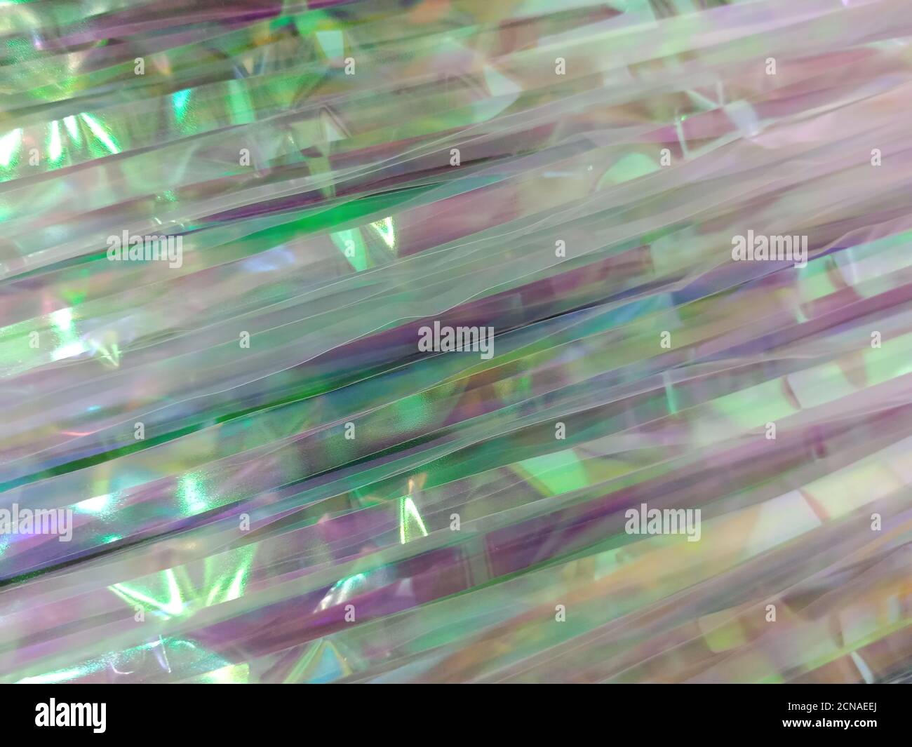 Holographic bright rainbow multicolor real crumpled texture background ...