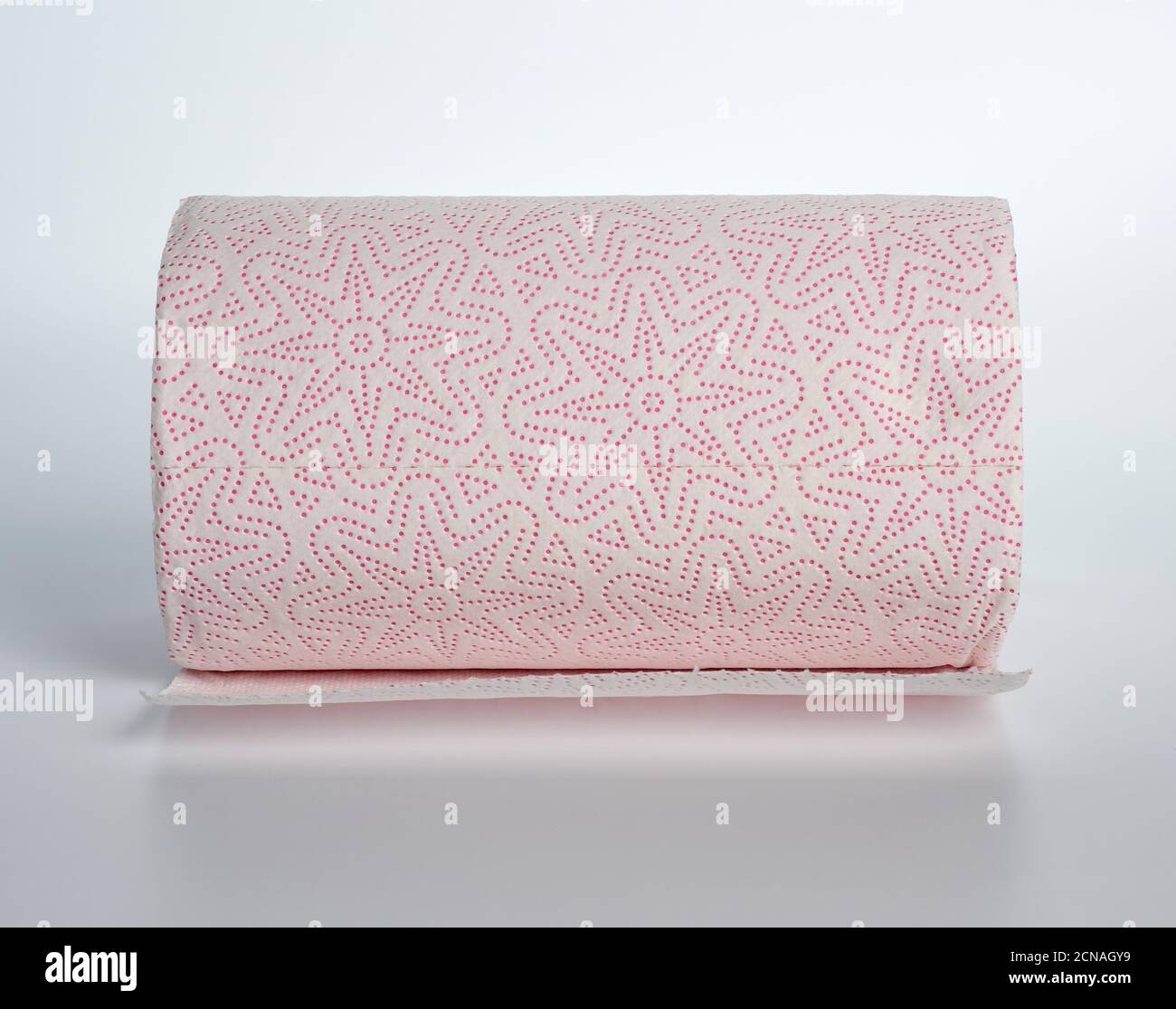 twisted roll of white paper towel on a white background Stock Photo - Alamy