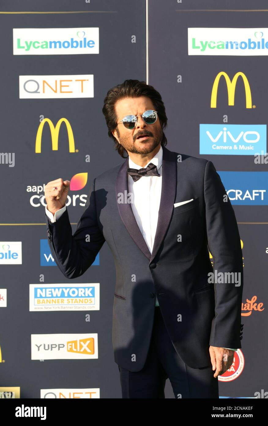Actor Anil Kapoor poses for a picture on the Green Carpet at the ...